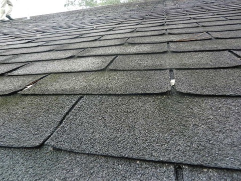 Curling Shingles - A Key Sign of Roof Aging - NRCIA